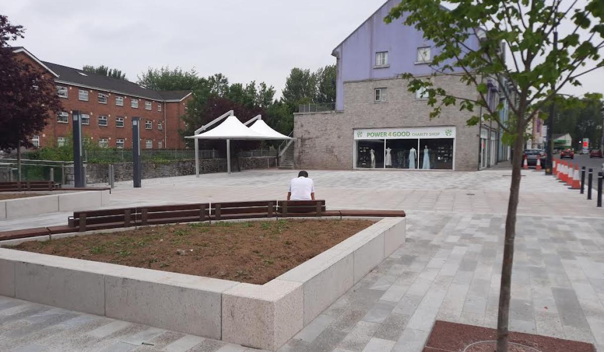 Delays in getting bespoke materials prevent final touches to square in ...