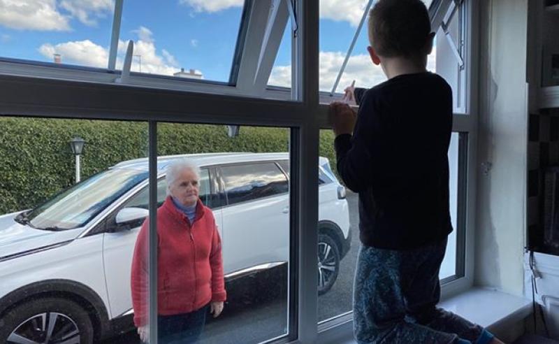 PICTURE: Offaly granny greets her grandkids through window - Offaly Live